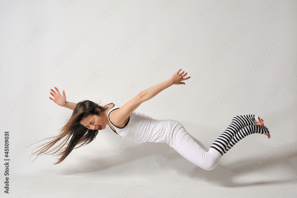 Woman fly - levitation isolated white background Stock Photo | Adobe Stock
