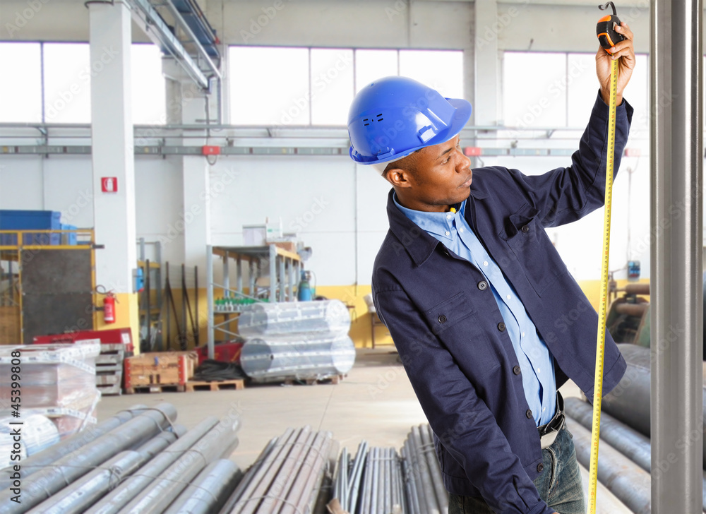 Worker using a tape Stock Photo | Adobe Stock