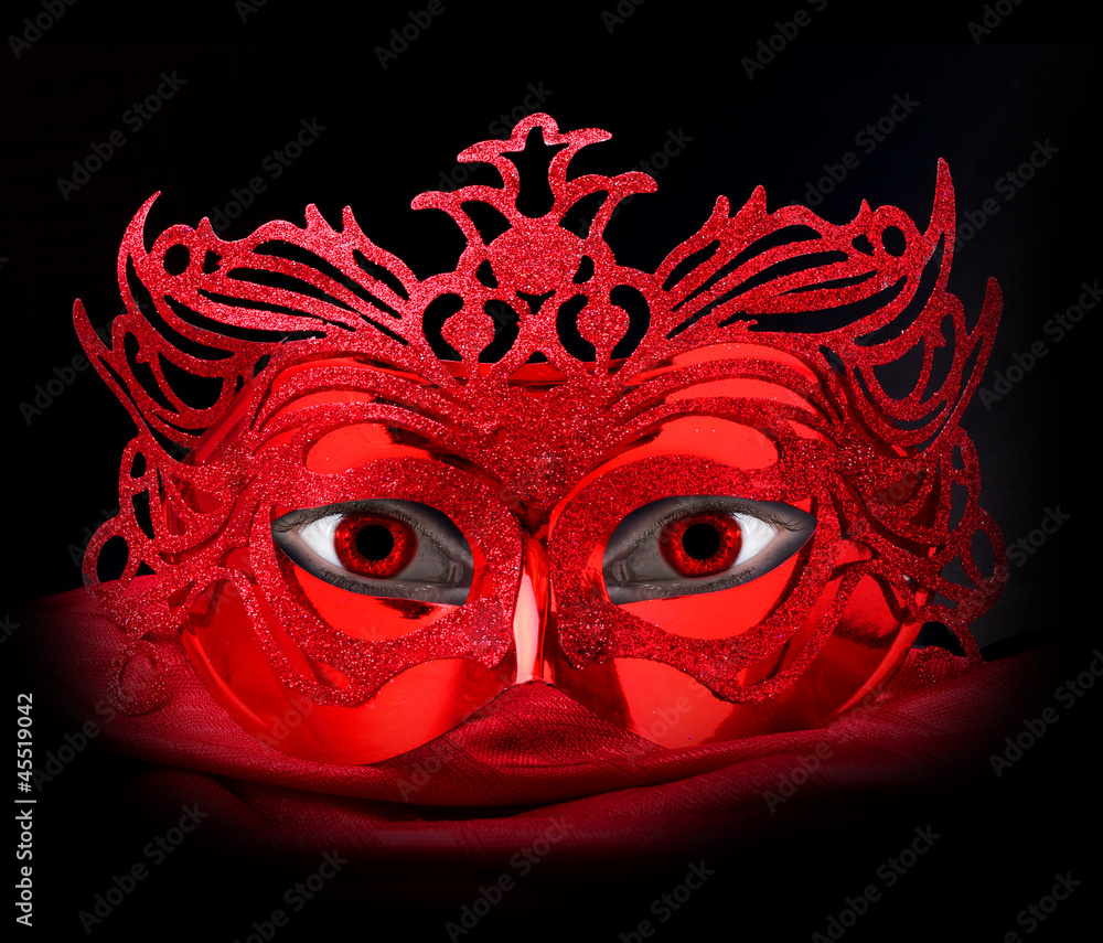Paper mask with red eye - Halloween theme. Stock Photo | Adobe Stock