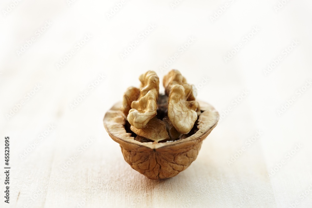 Half a walnut Stock Photo | Adobe Stock