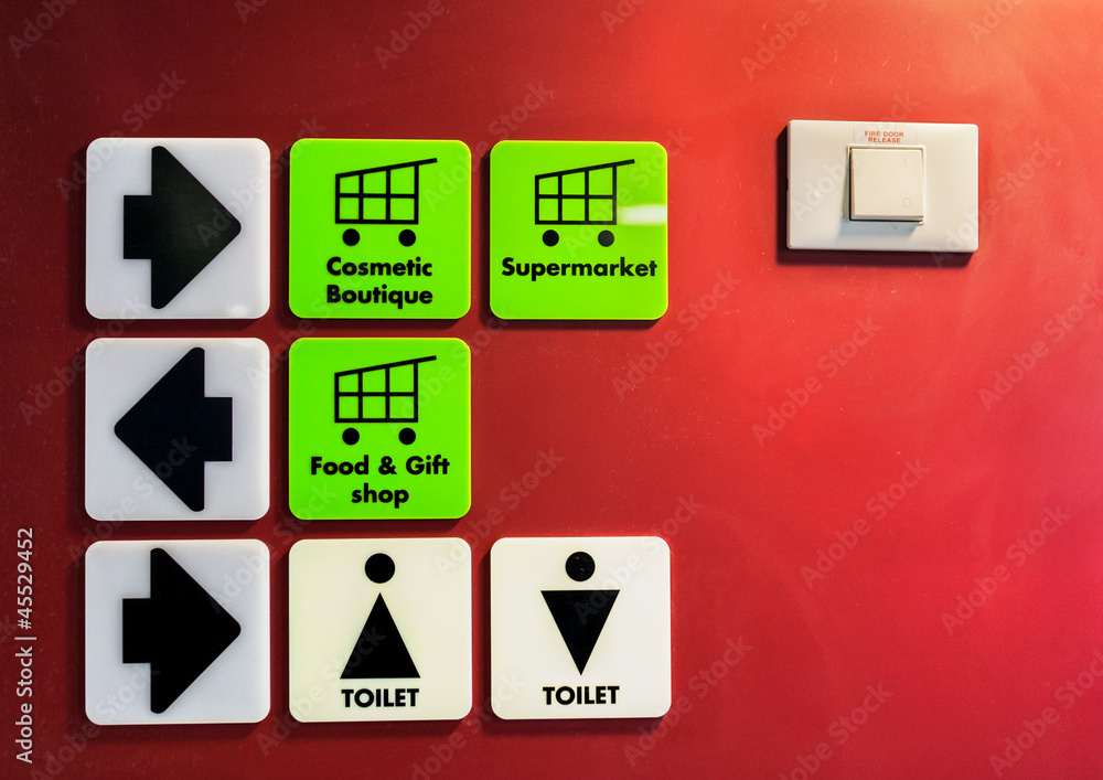 directions and signs on cruise ship wall Stock Photo | Adobe Stock