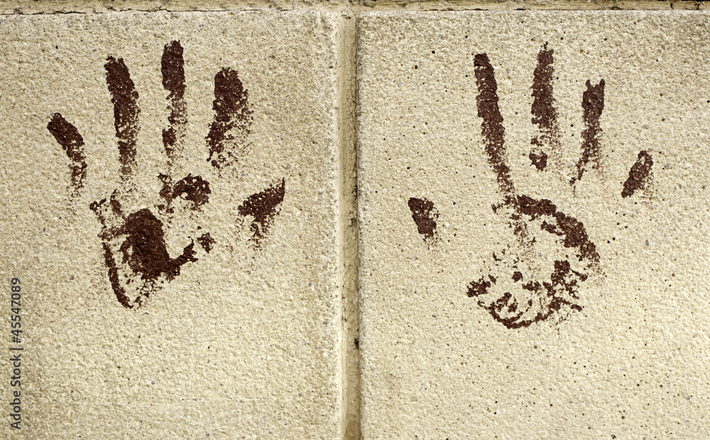Handprints Wall Stock Photo | Adobe Stock