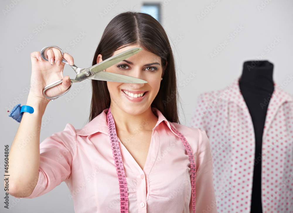 Modedesignerin mit Schneiderschere Stock Photo | Adobe Stock