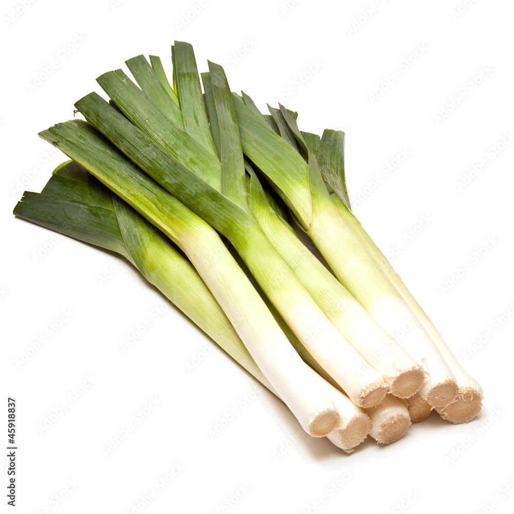 Leeks isolated on a white studio background. Stock Photo | Adobe Stock