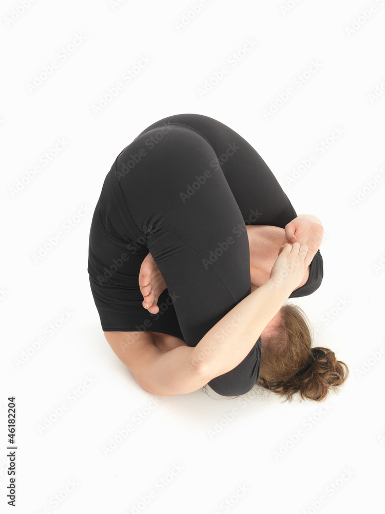 contorsion reversed yoga pose foto de Stock | Adobe Stock