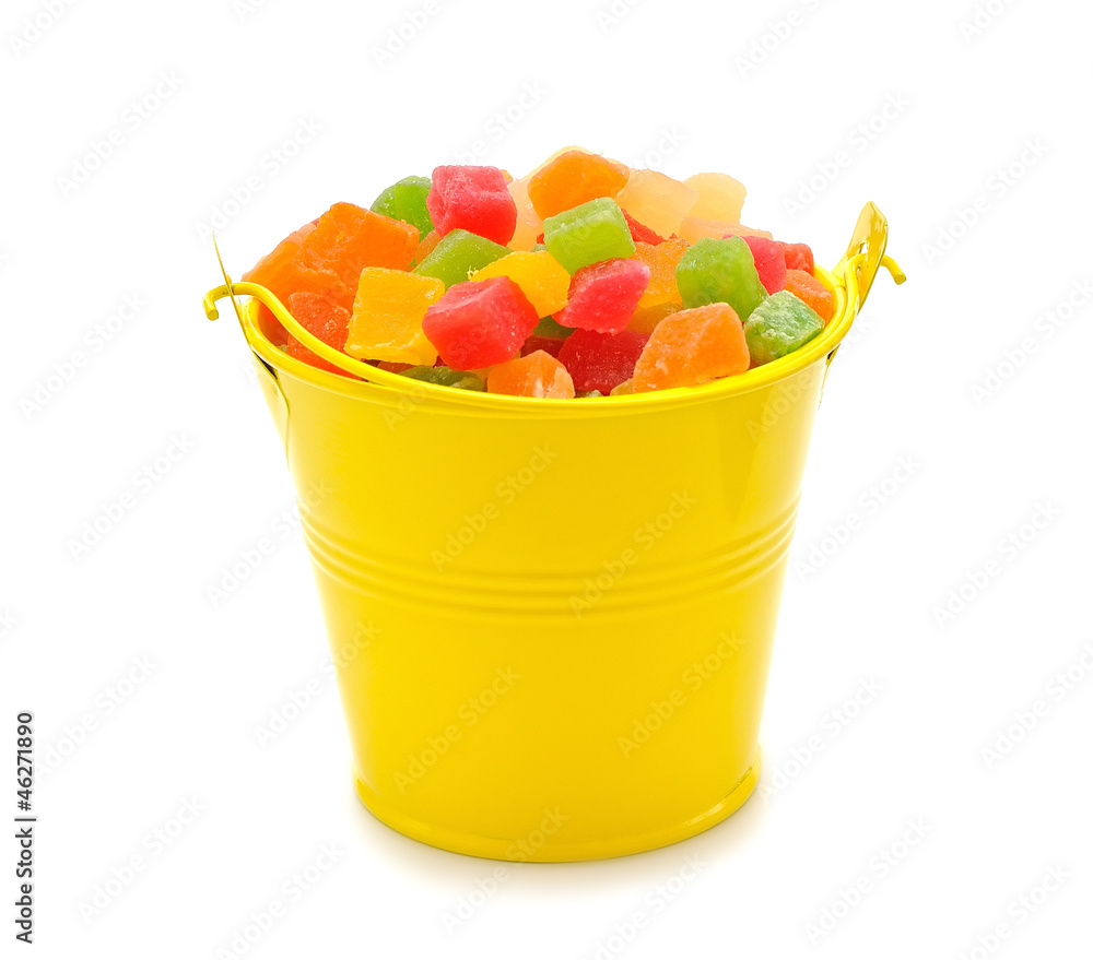 Colorful candied fruit in a small bucket on a white background Stock ...
