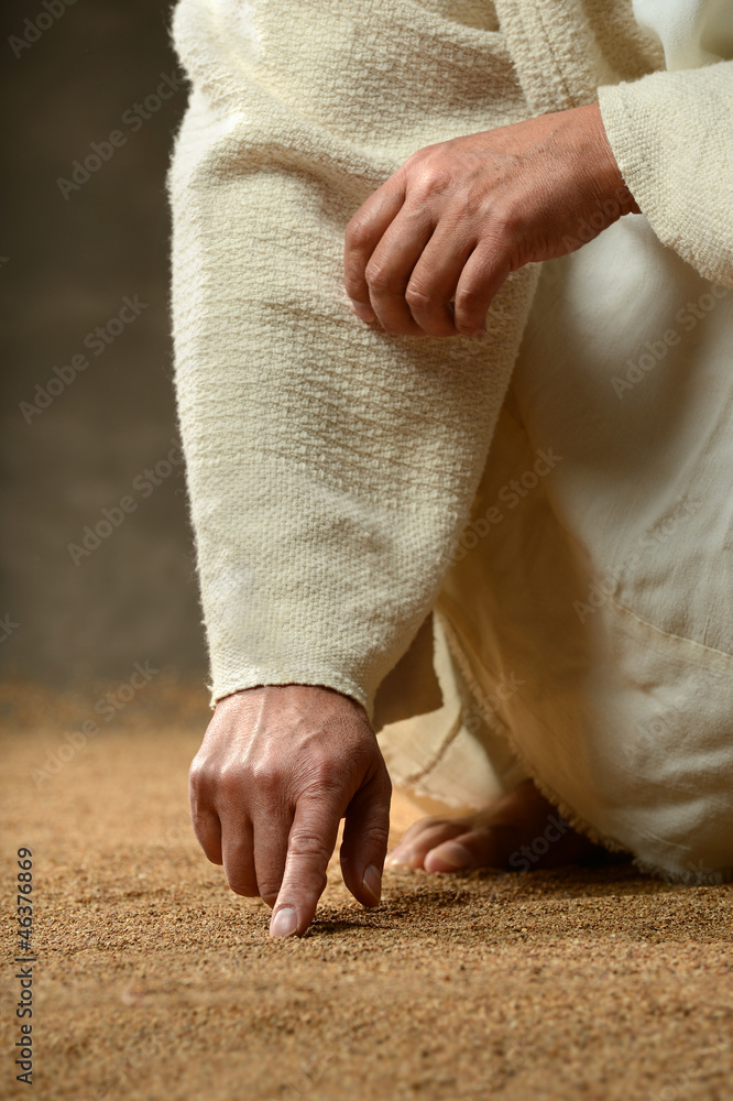 Jesus Finger Writing in the Sand Stock Photo | Adobe Stock