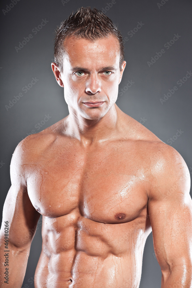 Shirtless muscled fitness man. Cool looking. Tough guy. Stock Photo ...