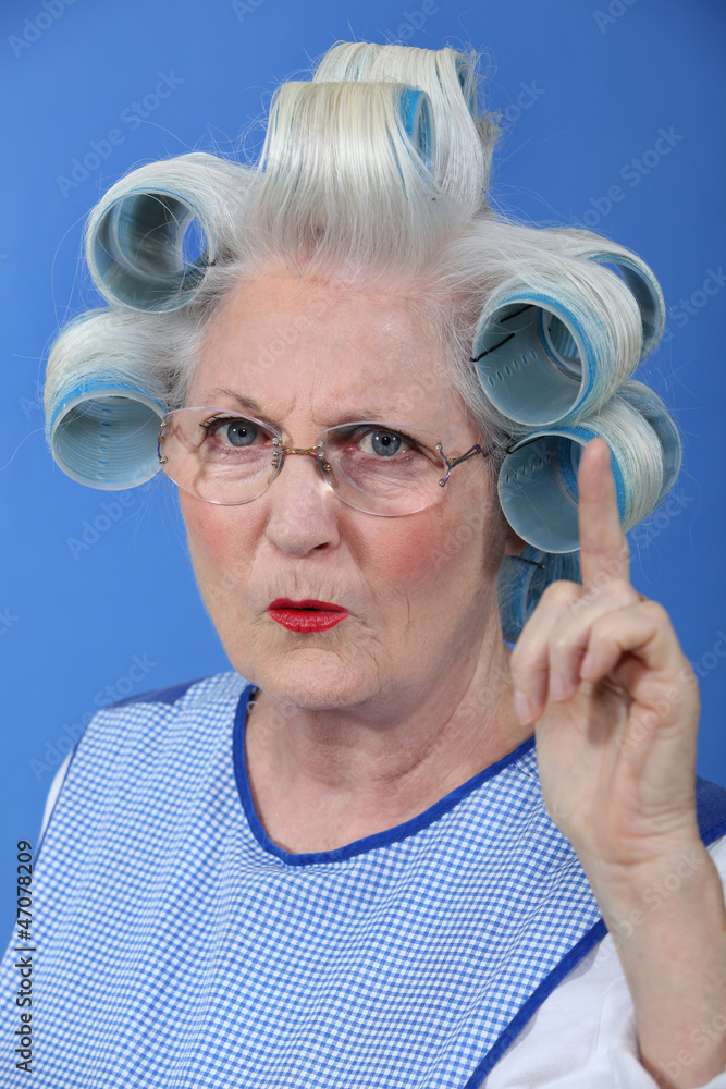 Old woman waving her finger in disapproval Stock Photo | Adobe Stock
