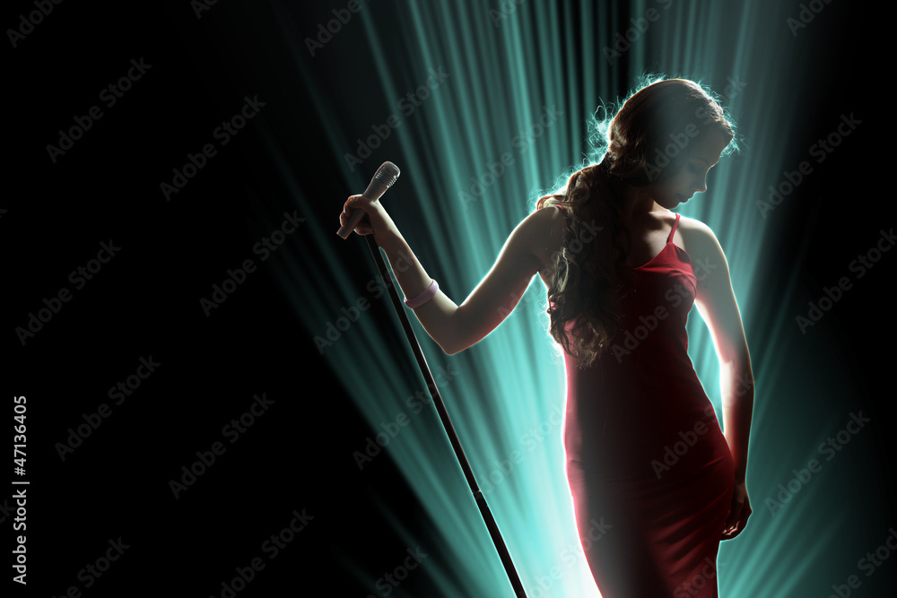 Female singer on the stage Stock Photo | Adobe Stock