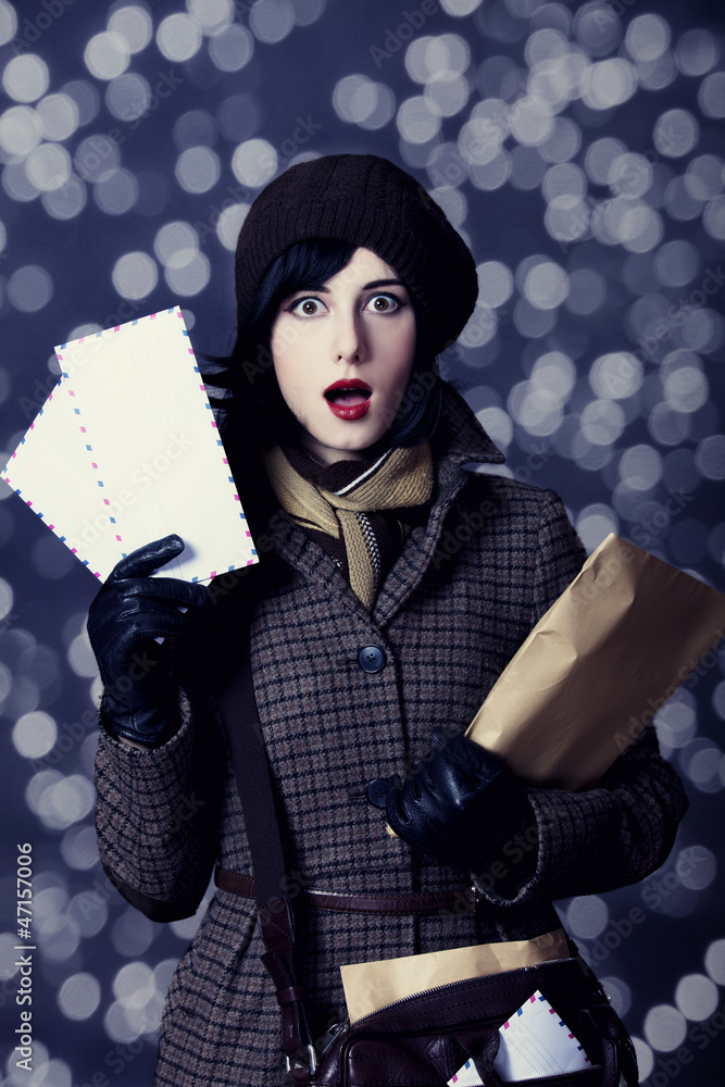 Young surprised postman girl with mail. Photo in old color style Stock ...