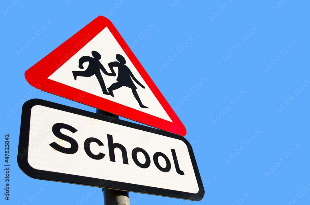 school warning sign on blue sky background Stock Photo | Adobe Stock