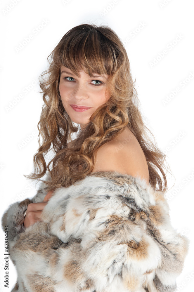 young beautiful woman with long hairs in fur coat Stock Photo | Adobe Stock