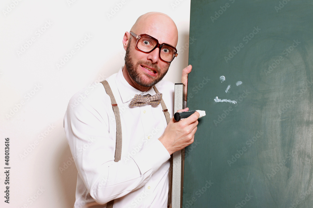 Lehrer an der Tafel Stock Photo | Adobe Stock
