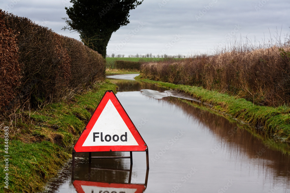 Flood warning sign Stock Photo | Adobe Stock