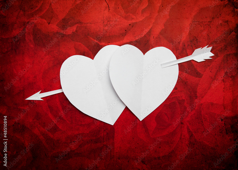 Vintage two paper hearts pierced with an arrow symbol for Valent Stock ...