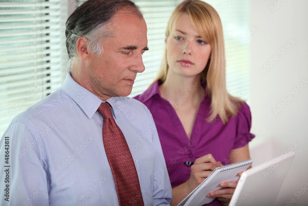 Secretary taking notes Stock Photo | Adobe Stock