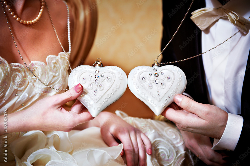 Heart-shaped mascots the bride and groom Stock Photo | Adobe Stock
