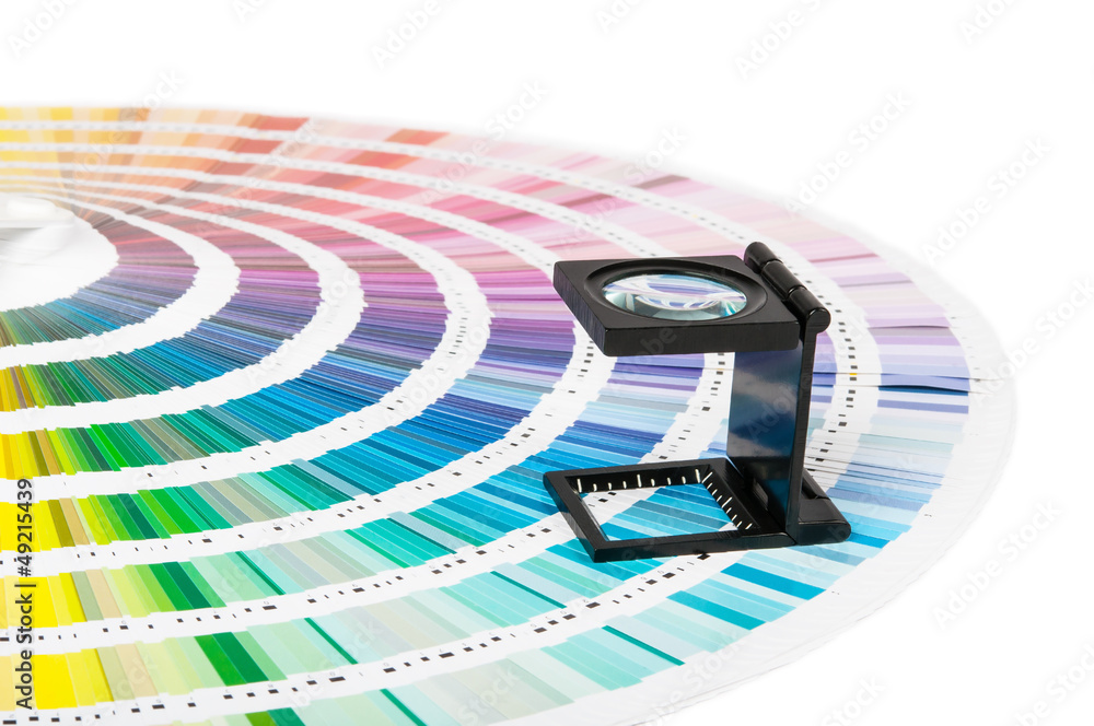 Magnifier and pantone guide Stock Photo | Adobe Stock