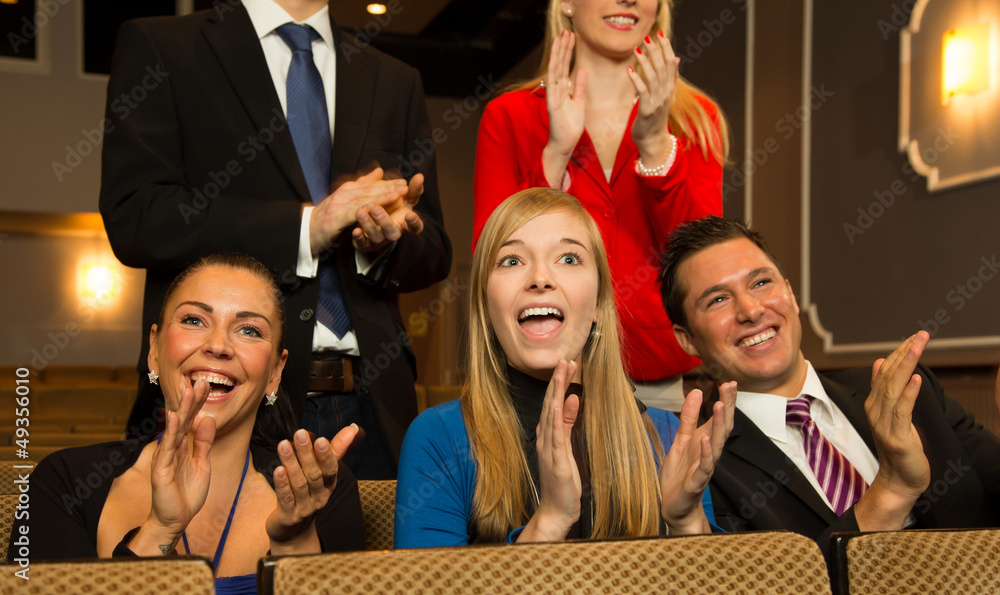 Theatre audience clapping and cheering Stock Photo | Adobe Stock