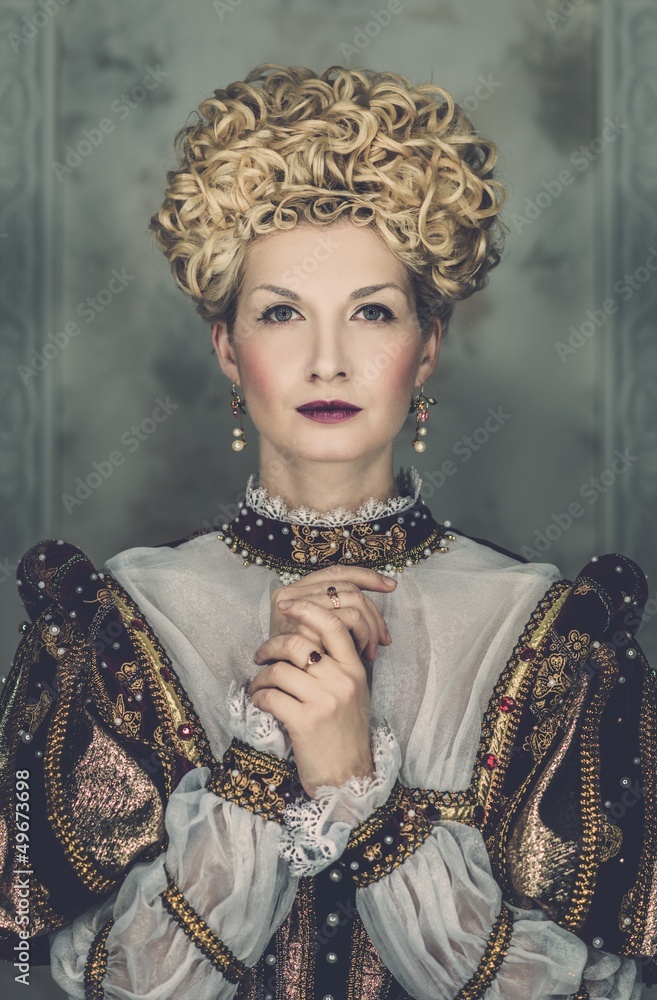 Picture of beautiful haughty queen in royal dress Stock Photo | Adobe Stock