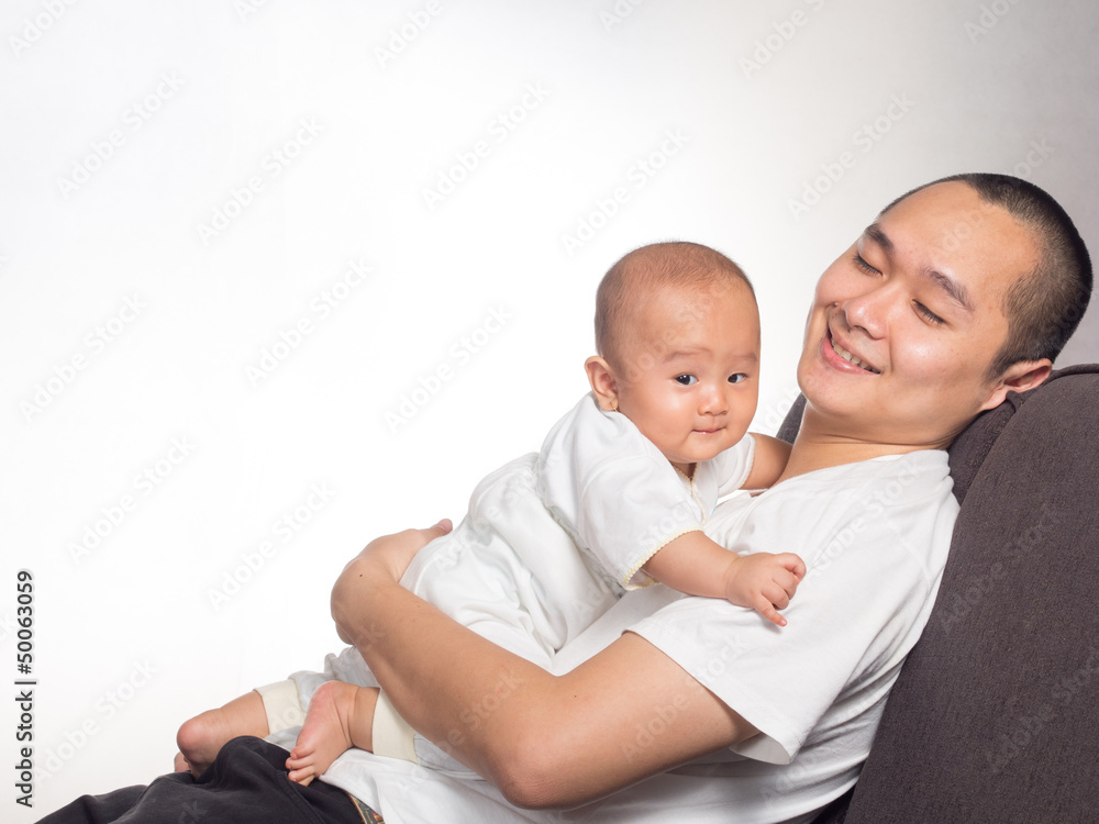 baby hugging dad Stock Photo | Adobe Stock