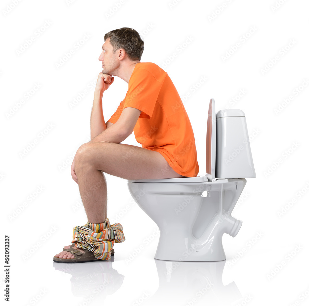 Thoughtful man sitting on the toilet, white background ภาพถ่ายสต็อก ...