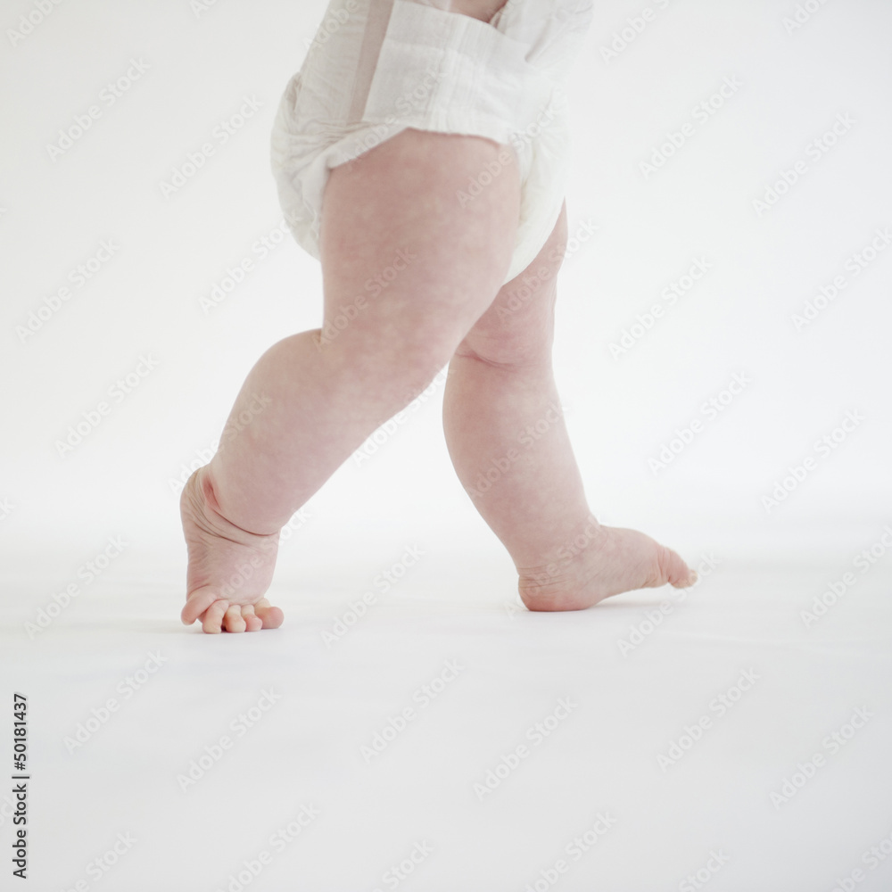 Caucasian baby girl walking Stock Photo | Adobe Stock