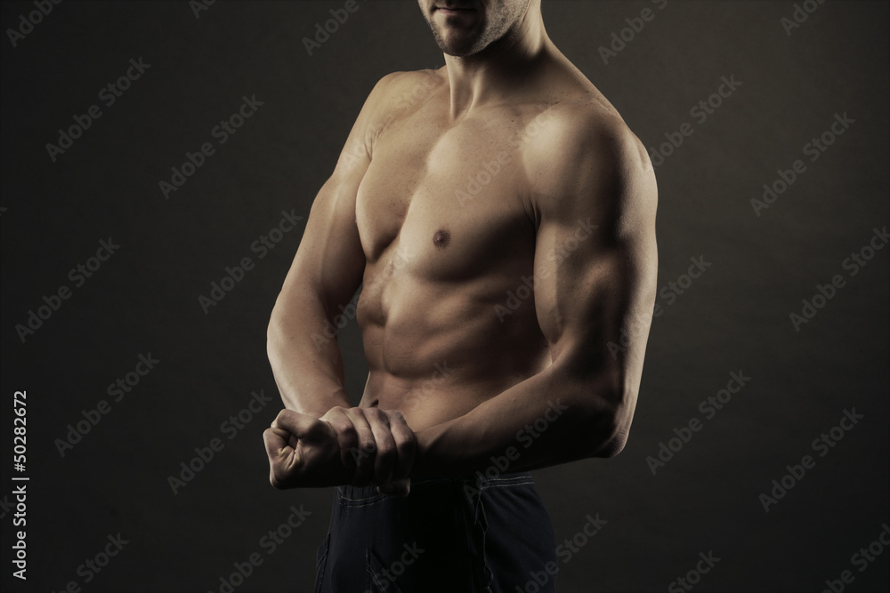 Body Builder Flexing Biceps Stock Photo Adobe Stock