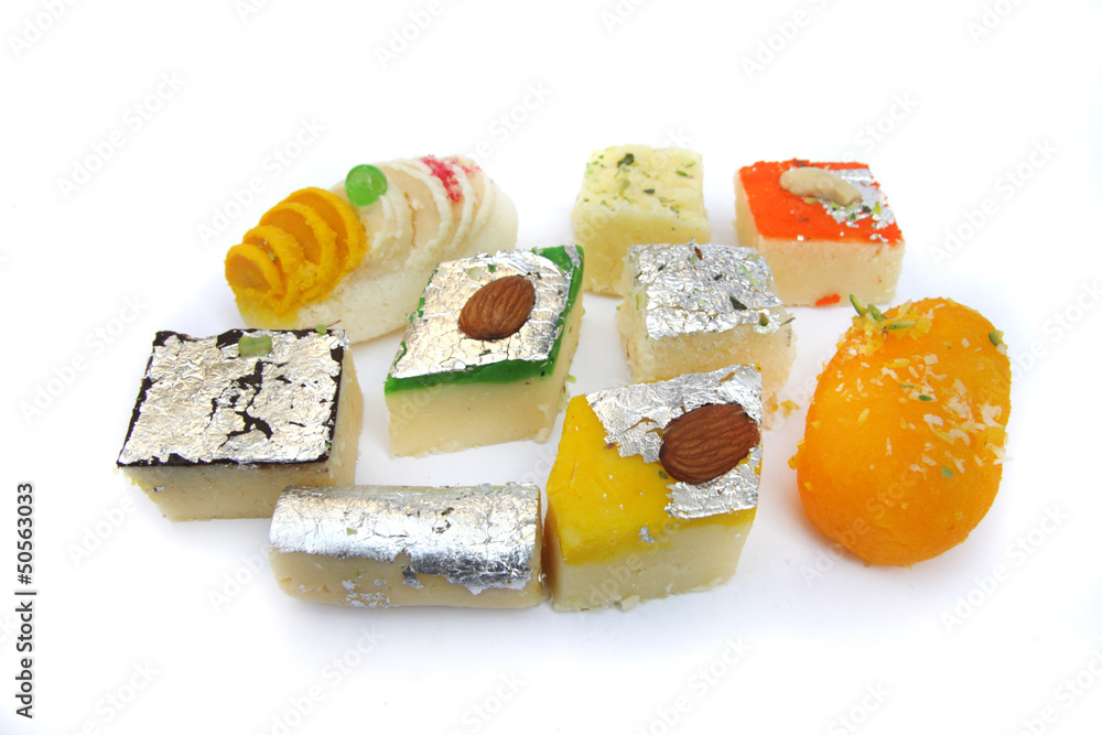 Various Indian sweets on white background Stock Photo | Adobe Stock