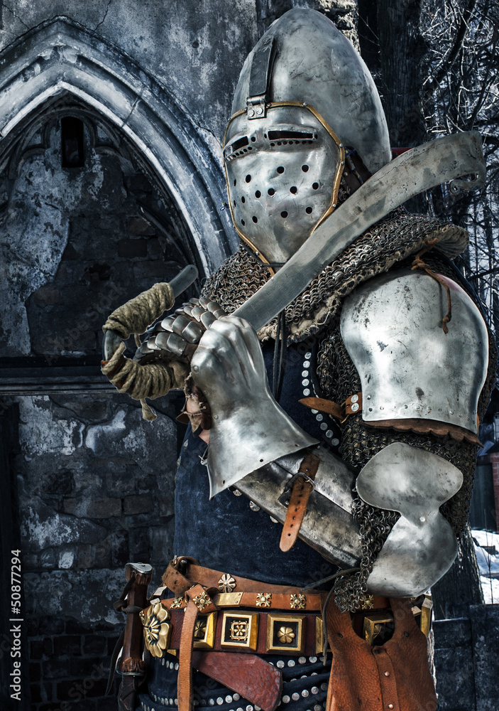 Armored knight with his sword Stock Photo | Adobe Stock
