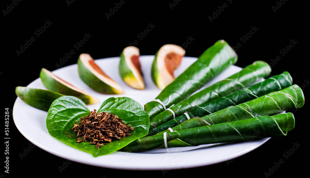 Areca nut, betel nut chewed with the leaf is mild stimulant. Stock ...