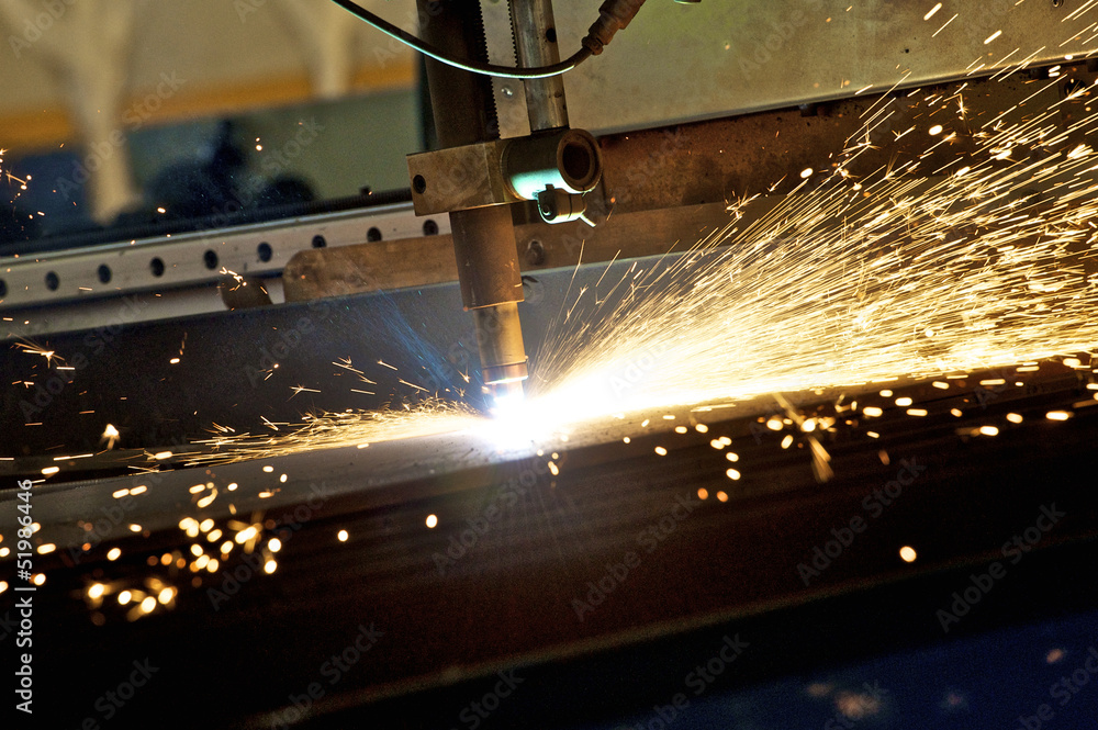Arc welder with welding sparks Stock Photo | Adobe Stock
