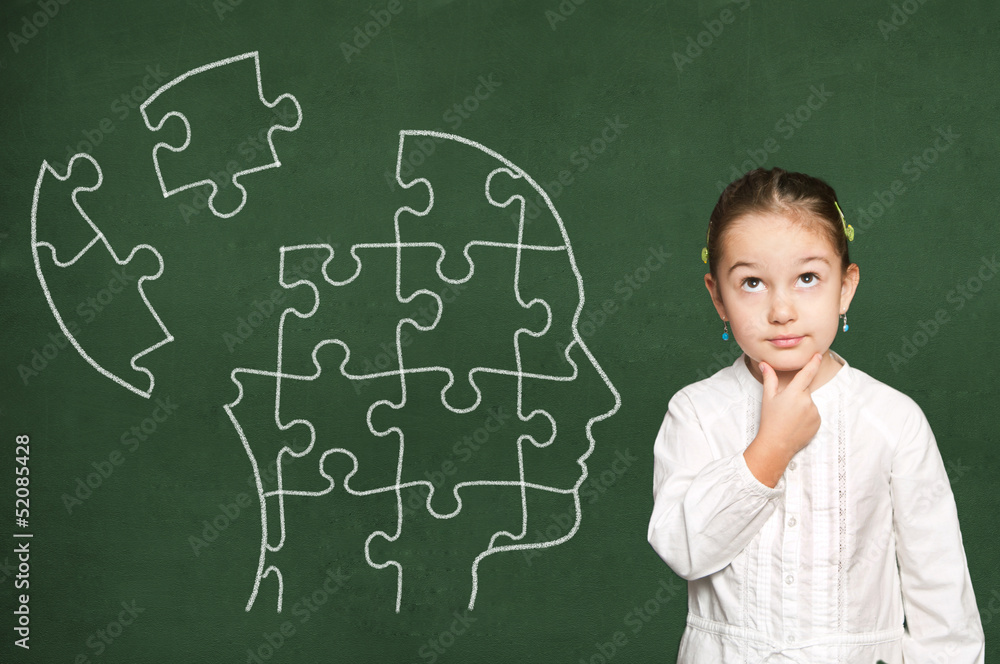 Puzzle in head on chalkboard Stock Photo | Adobe Stock
