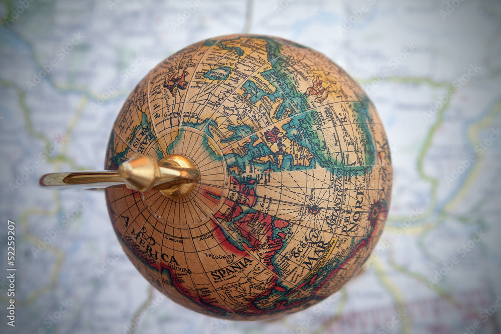 Worldwide globe over a map Stock Photo | Adobe Stock