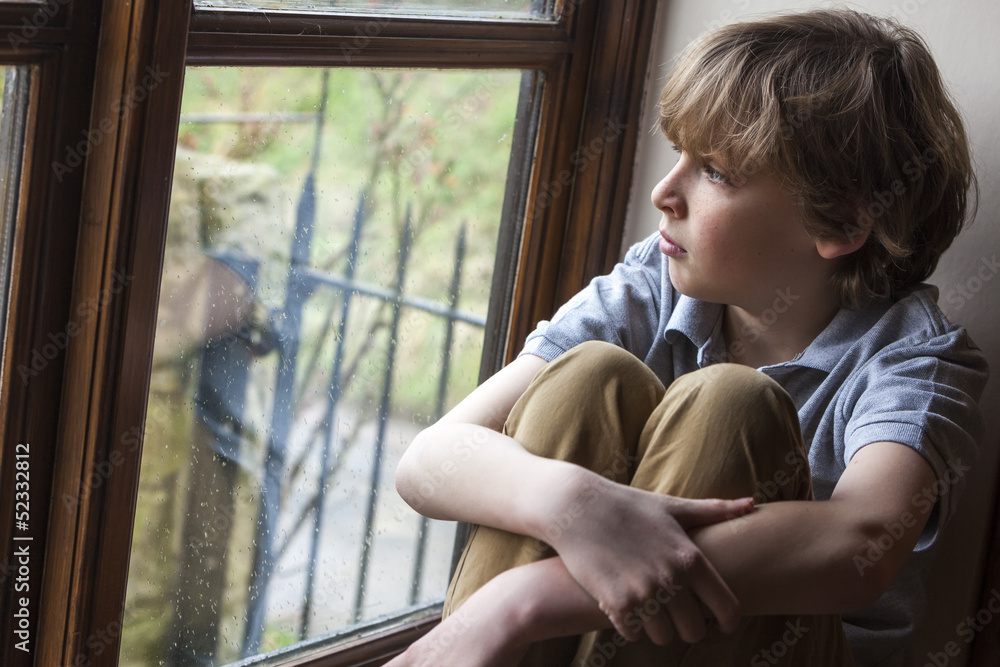 Sad Young Boy Child Looking Out Window Stock Photo | Adobe Stock