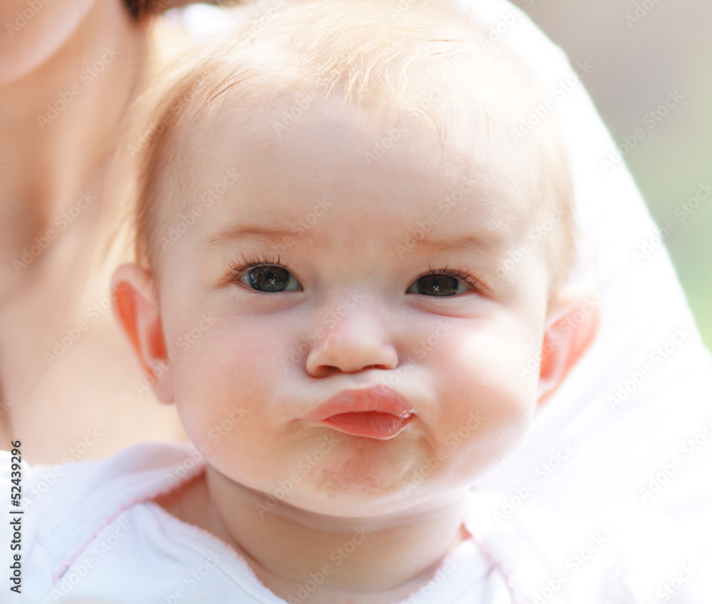 Beautiful baby making face Stock Photo | Adobe Stock