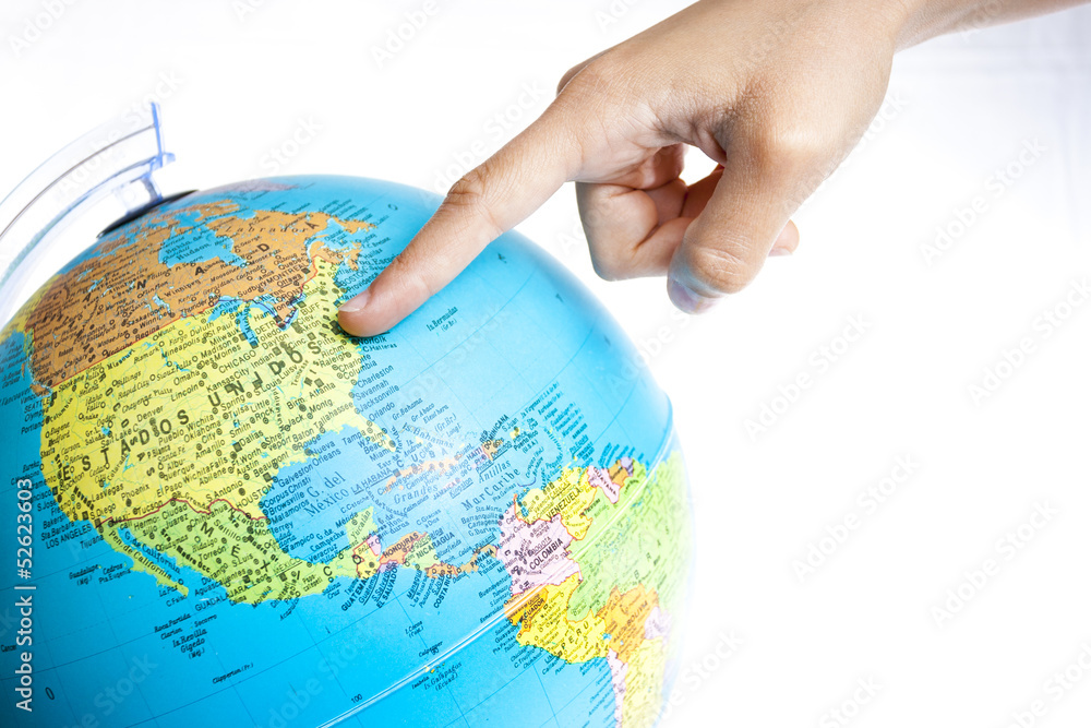 A Finger pointing to United States of America in a World Globe Stock ...