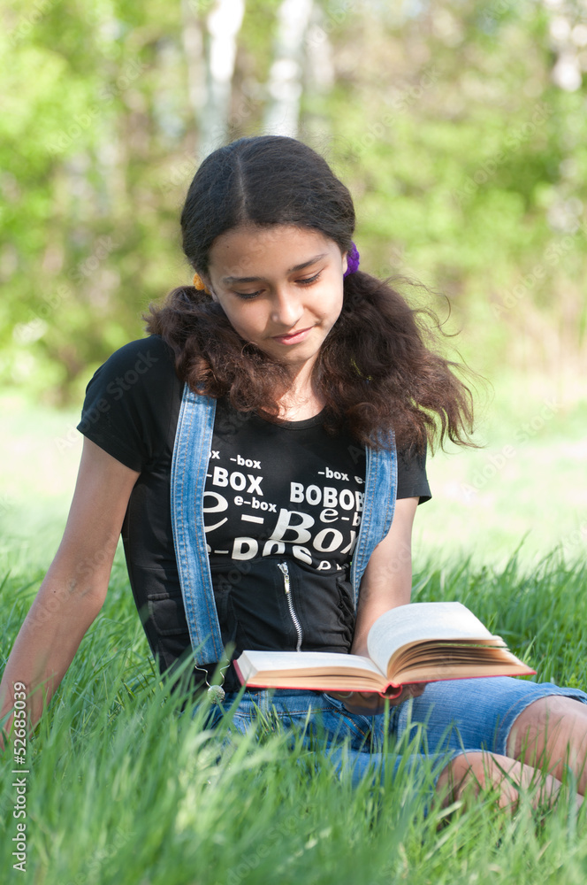 Teen Girl Reading A Book