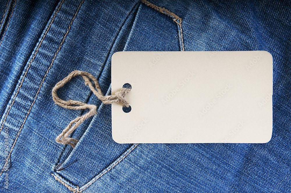 Blue jeans with tag label. Stock Photo | Adobe Stock