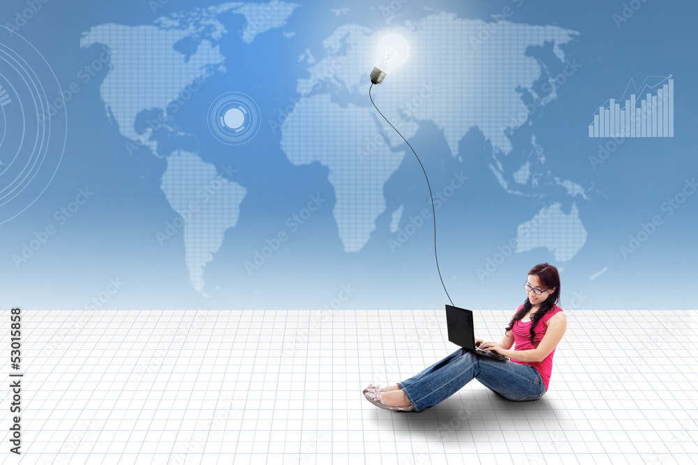 Asian female using laptop with lightbulb on world map background Stock ...