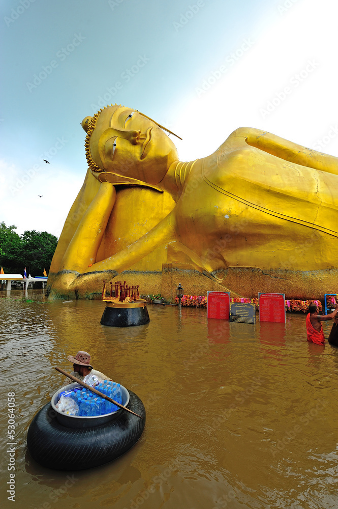 flood waters overtake a big buddha statue in Thailand Stock Photo ...