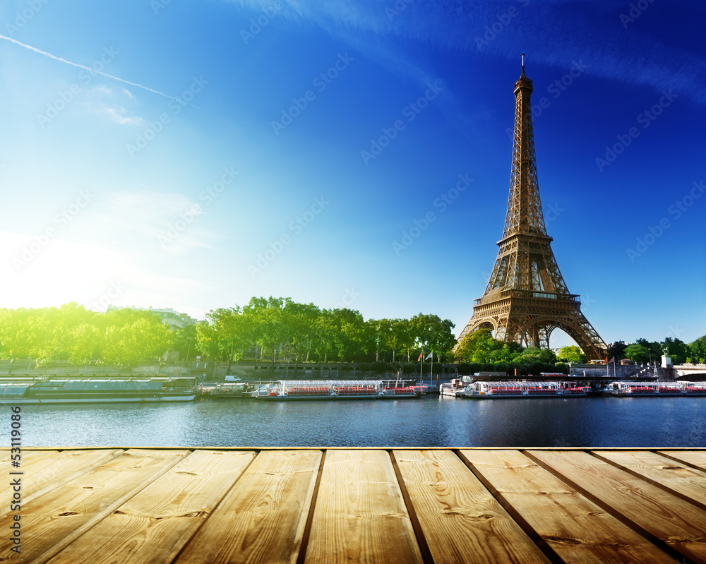 background with wooden deck table and Eiffel tower in Paris Stock Photo ...