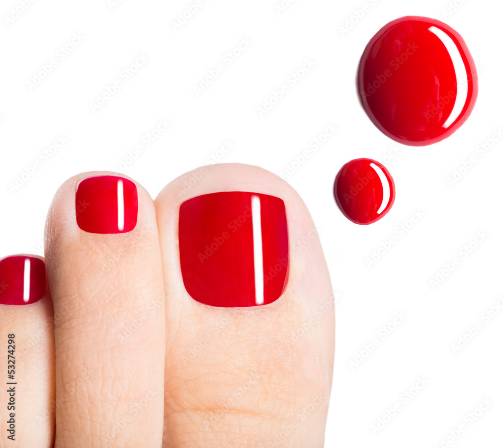 Beautiful female toes with red pedicure and drops of nail polish Stock ...
