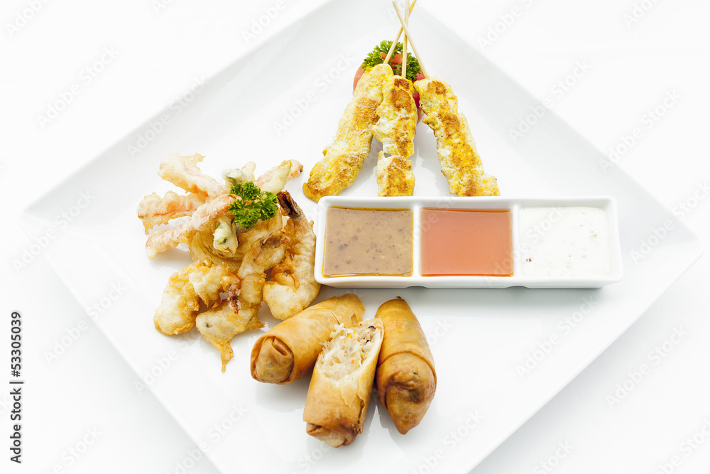 Thai favourites with spring roll vegetable,chicken satay,shrimp Stock ...