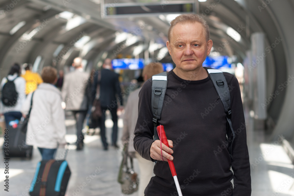 Visually impaired person in busy public places Stock Photo | Adobe Stock