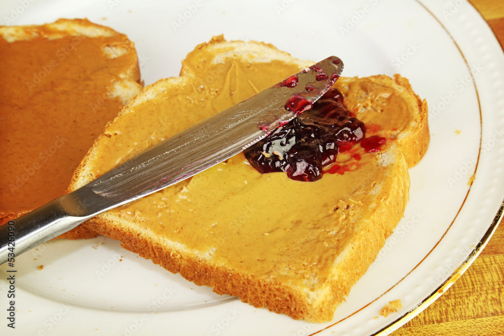 Spreading Jelly On Bread