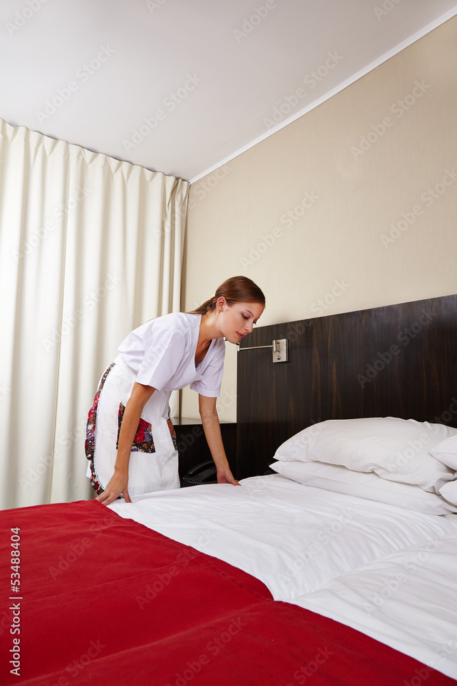Housekeeping maid cleaning hotel room Stock Photo | Adobe Stock