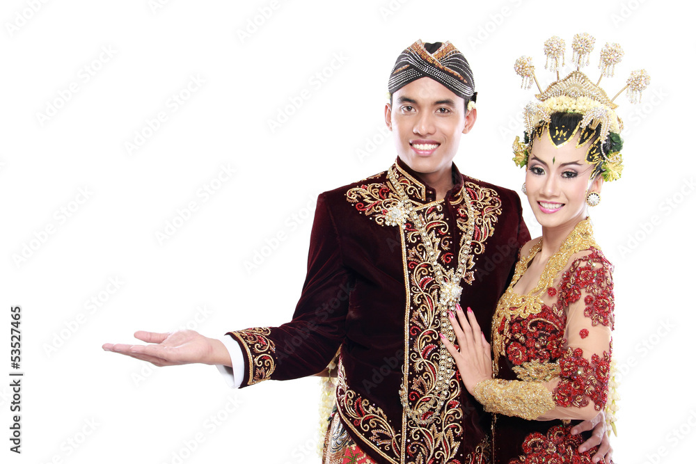 Traditional java wedding couple husband and wife presenting blan Stock ...