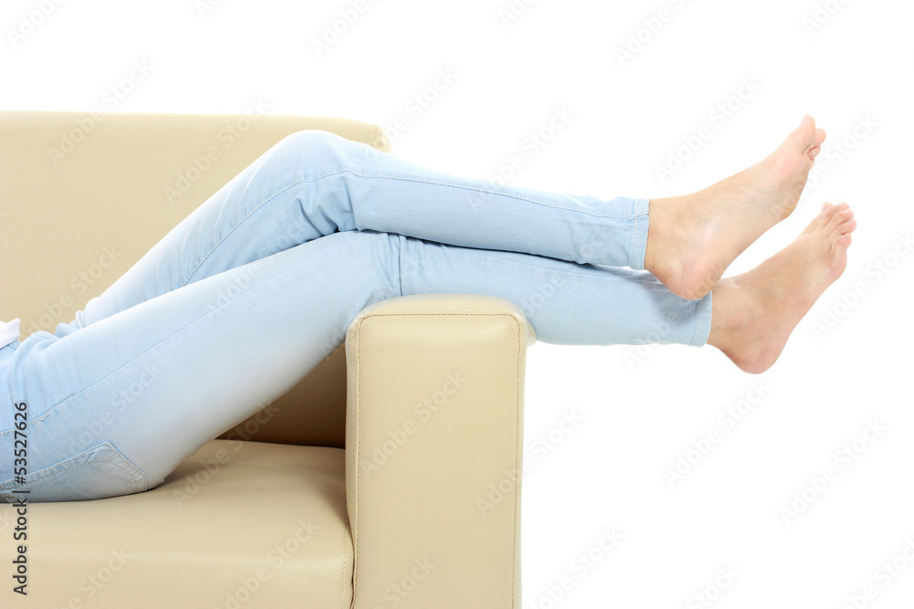 Young woman putting her feet up Stock Photo | Adobe Stock
